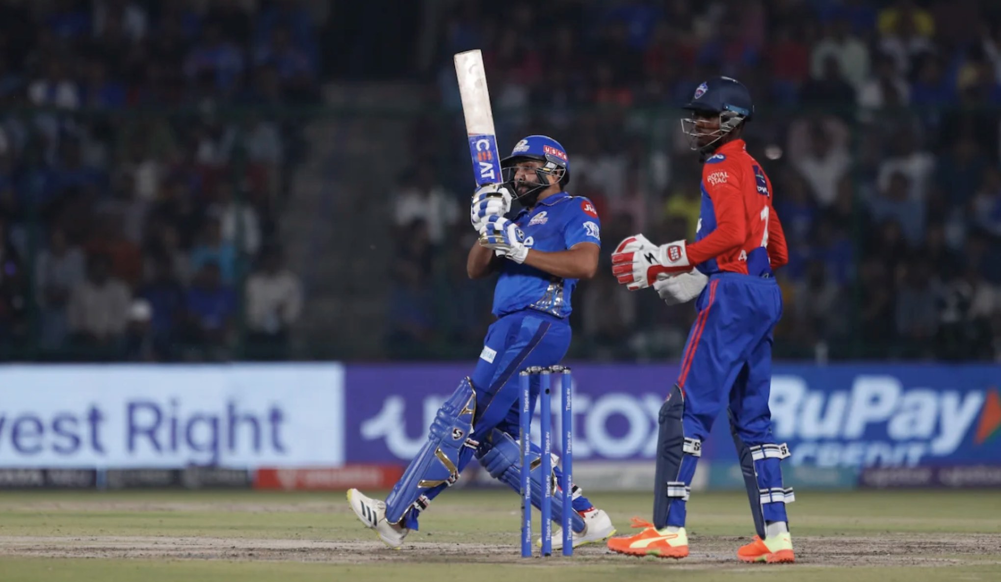 Mumbai win first IPL game in tense chase